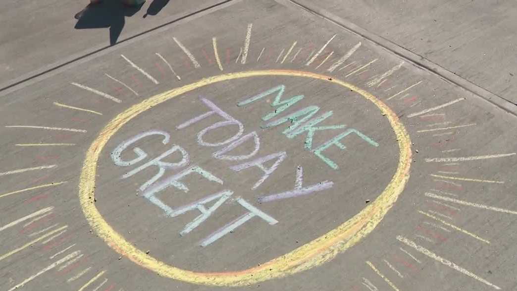 Families spread positivity at Chalk the Walk event in Nashua