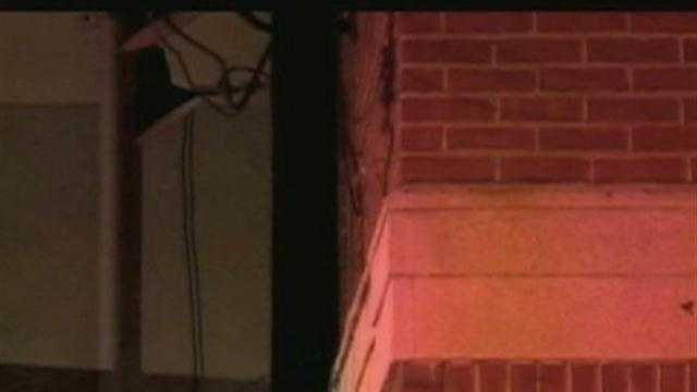 Woman trapped between walls