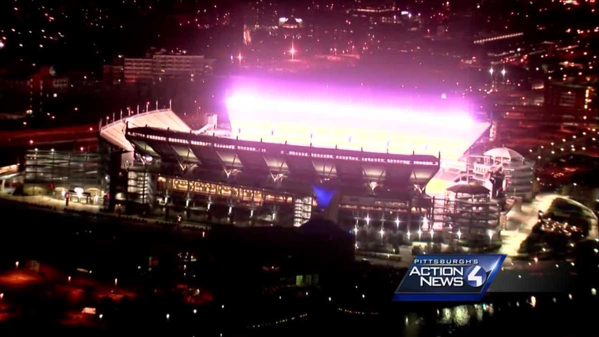 Heinz Field lit up at night after Dan Rooney's death
