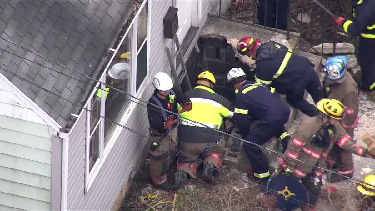 'Just pray': Porch collapses, woman pinned under 1,500-pound concrete slab