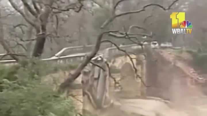 111-year-old bridge collapses in flood waters