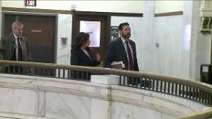 Alison and Robert Motta walk into court for Anthony Garcia hearing