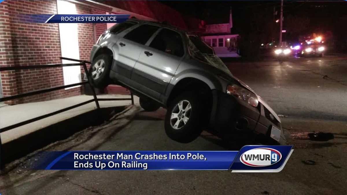 Rochester man crashes into pole, ends up on railing