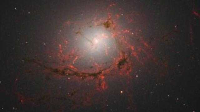 NASA Releases Image of Black Hole Eating Galaxy