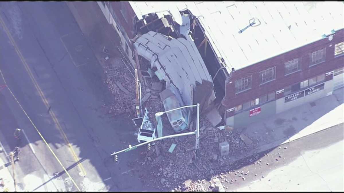SUV hits building causing partial collapse