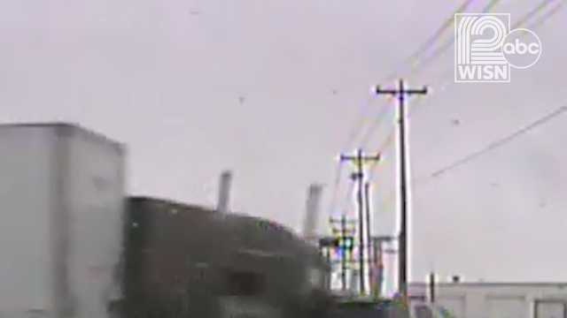 Dash camera records tractor-trailer, squad car crash