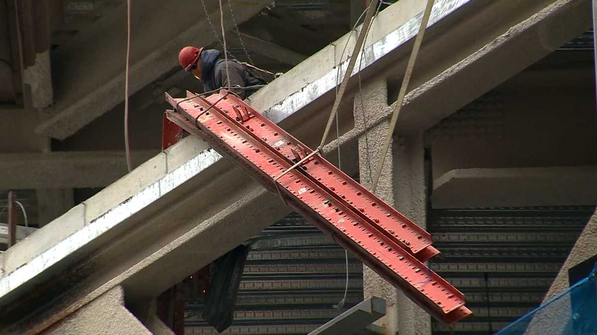 Beam falls from near top of South Station Tower construction site