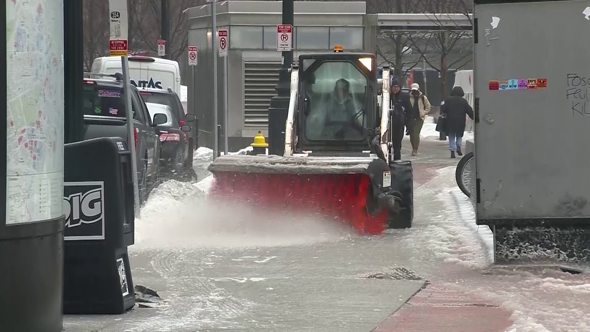 Storm covers trees, cars, walkways in Boston with ice