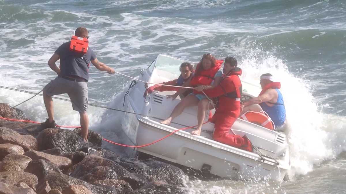 Several people rescued from sinking boat near Cape Cod Canal