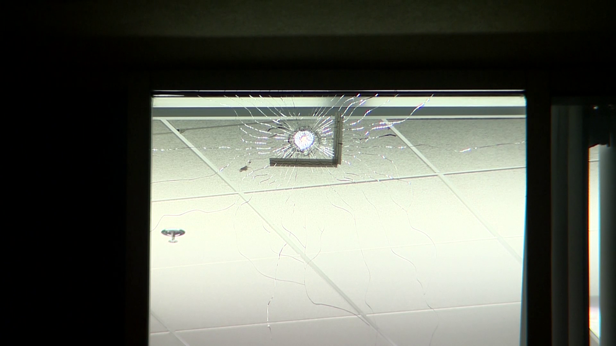 Bullet hits window at Boston police headquarters in Roxbury