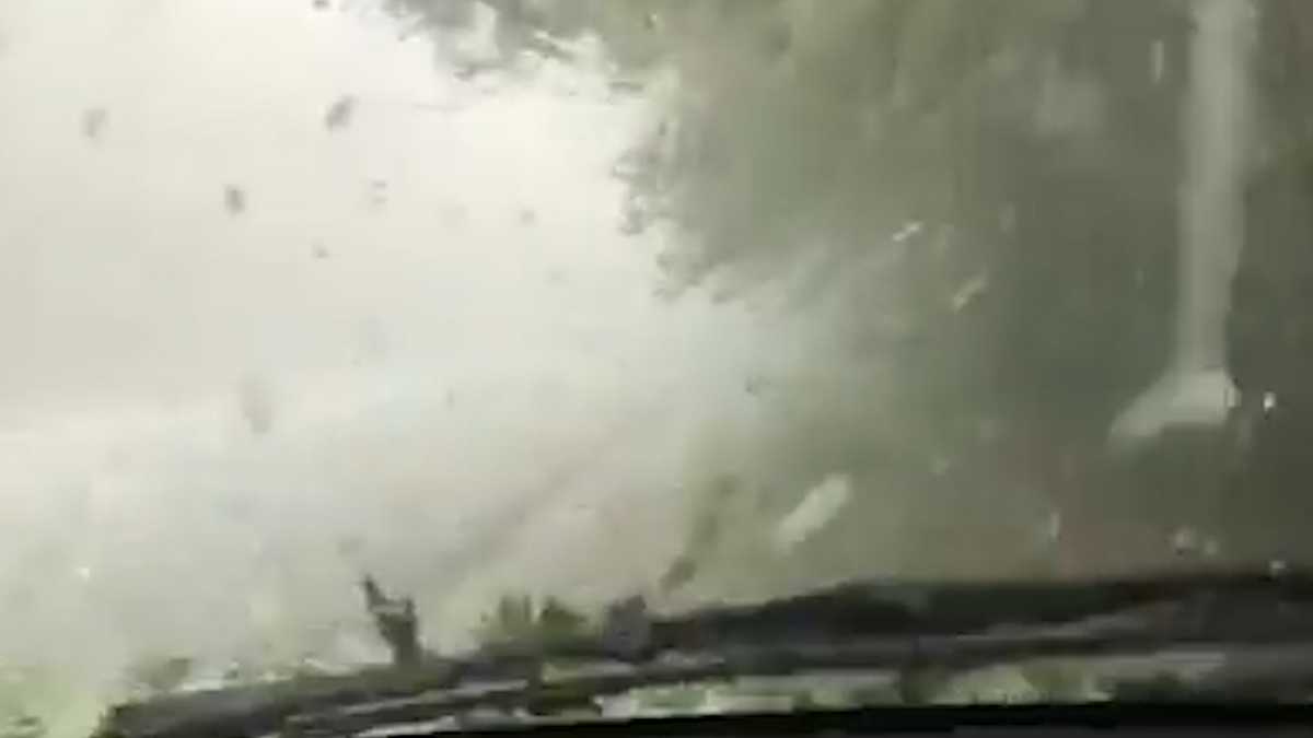 Is this summer? Snow plows used to clear hail from storm in Maine