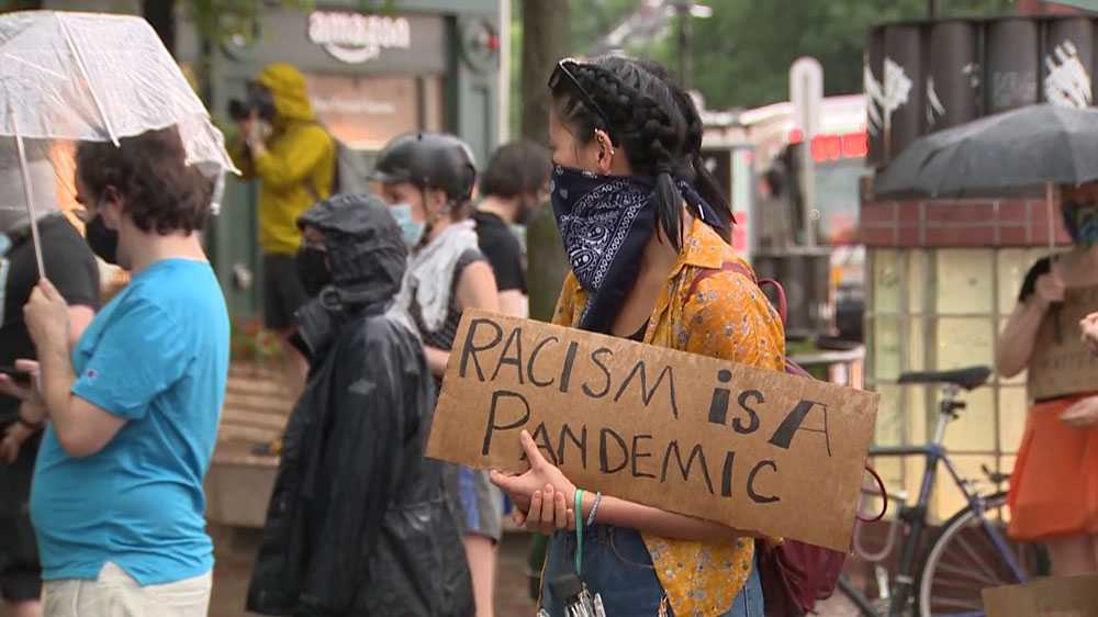 Hundreds march, rally through Cambridge in peaceful protest