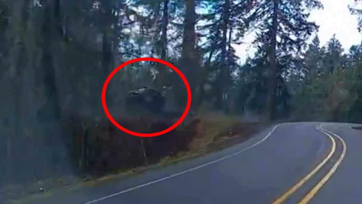 Caught on Video: Distracted driver launches off road, down cliff