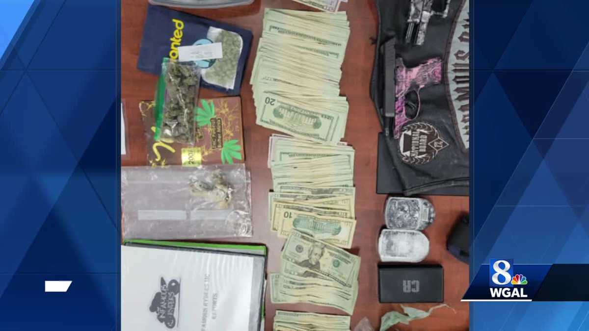 Pa. police say they found drugs, guns, cash and body armor inside home