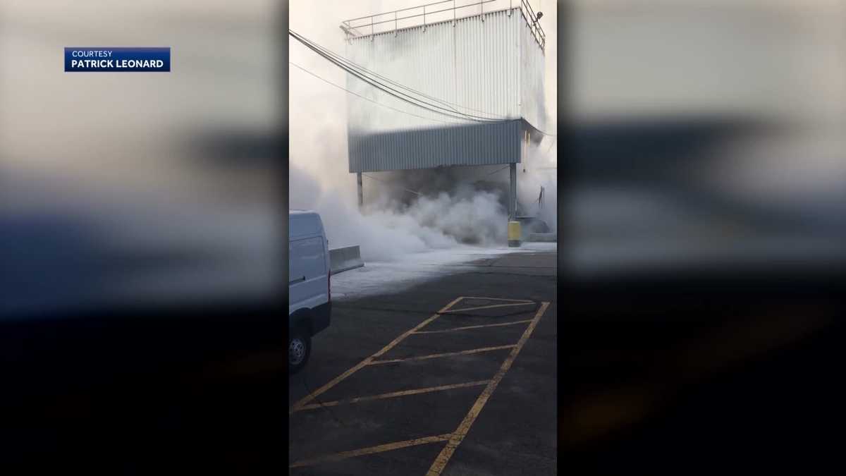 Cement powder spills from bottom of silo, prompting hazmat response