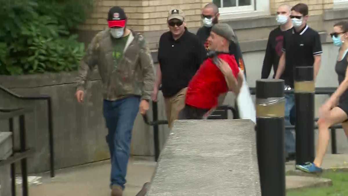 Activist confronts NSC-131 founder outside Boston courthouse