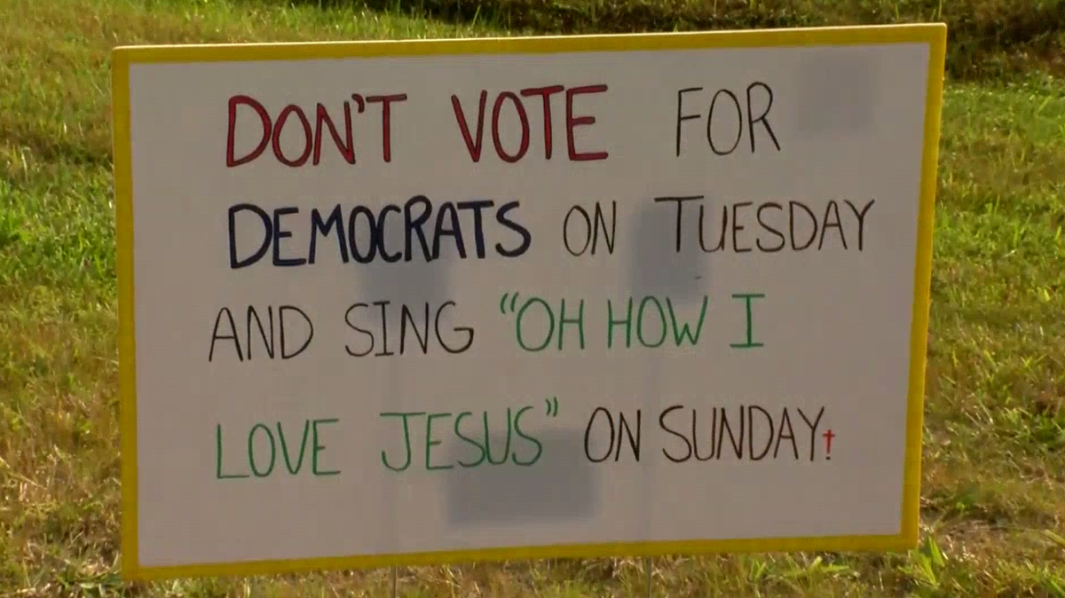 Sign outside Florida church serving as polling place criticizes Democrats