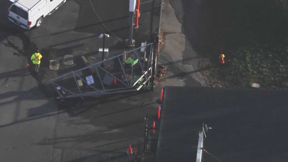 Woman crashes car through gate, drives onto tarmac at Norwood Airport