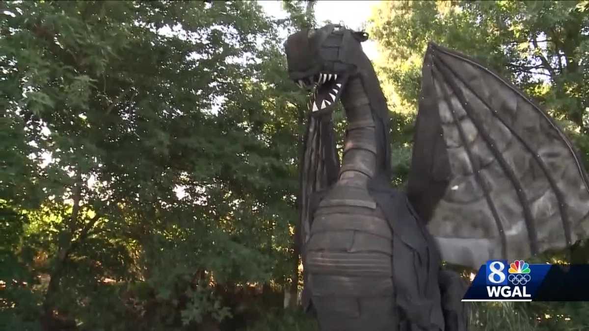 Man transforms old tires into 8-foot-tall, fire-breathing dragon
