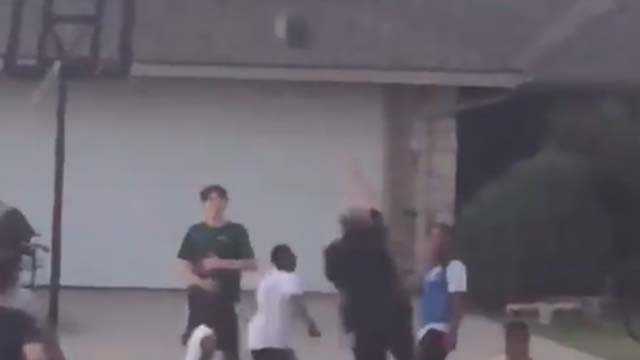 Watch: El Reno officer enjoys game of basketball with neighborhood children