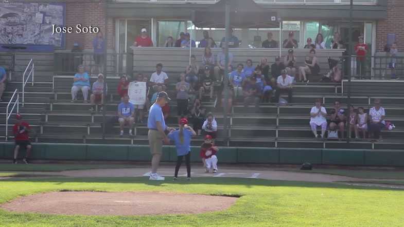 Hartland girl with rare cancer throws out first pitch at Helfaer Field