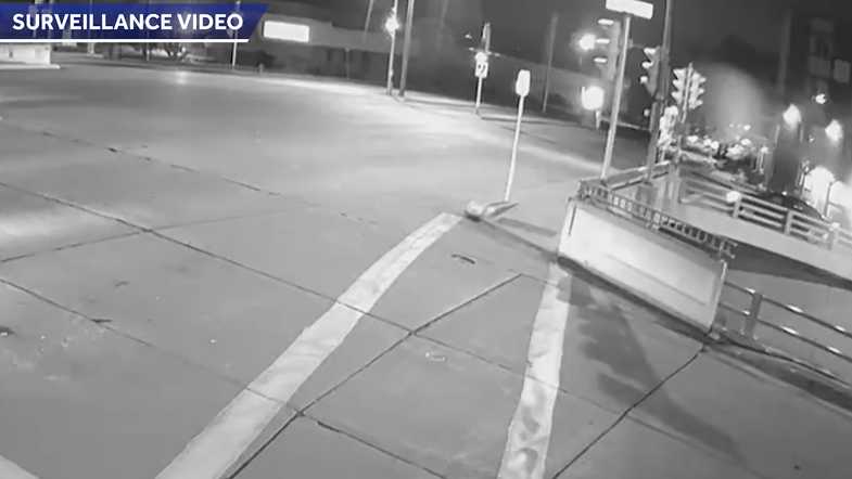 Surveillance video shows car speed through intersection, crash