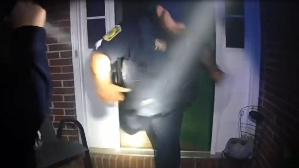 Georgia: Video shows cops kicking in door to save woman from fire