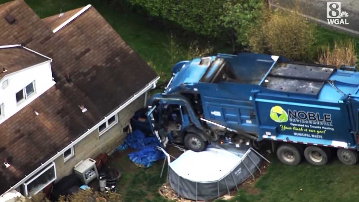 Garbage truck crashes into home in Allegheny County, Pa.