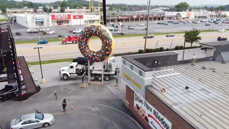 Giant donut once again sits atop Maple Donuts in York