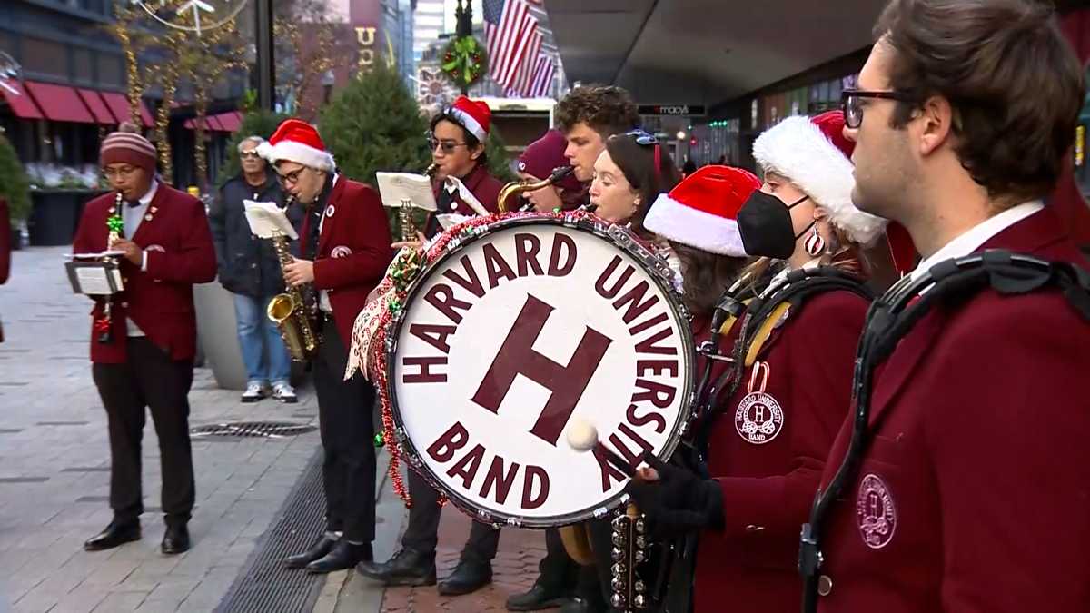 Harvard's student band plays holiday music for shoppers in Boston