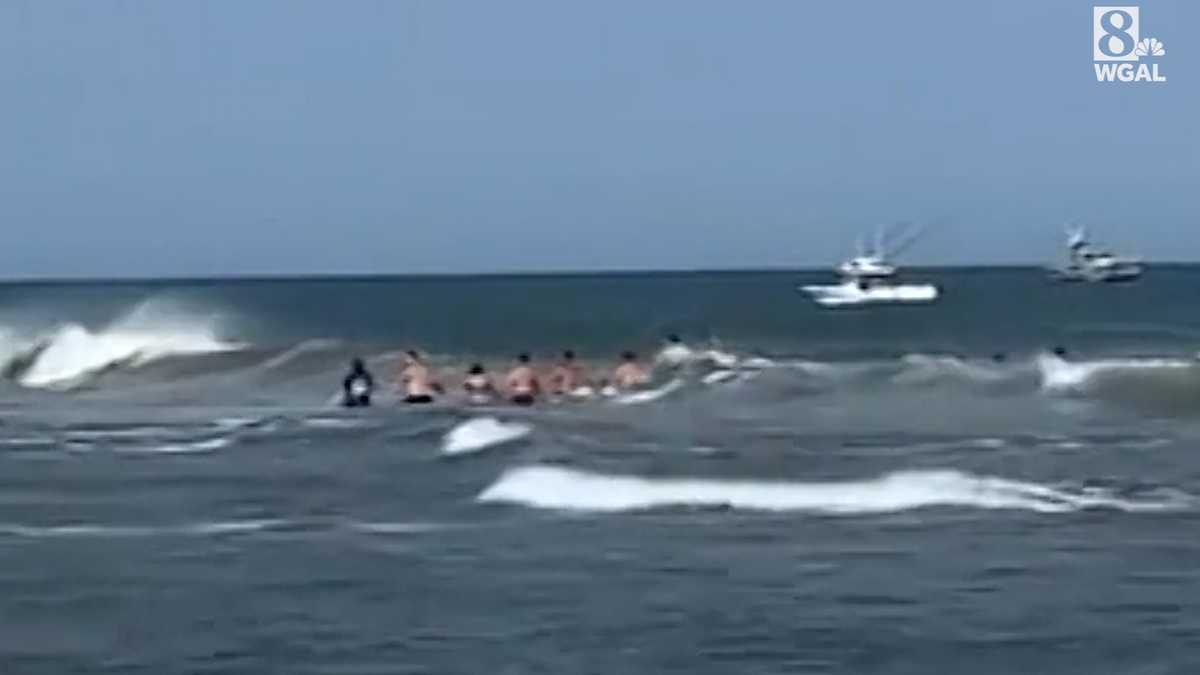 Beachgoers create human chain on Jersey Shore to rescue swimmer