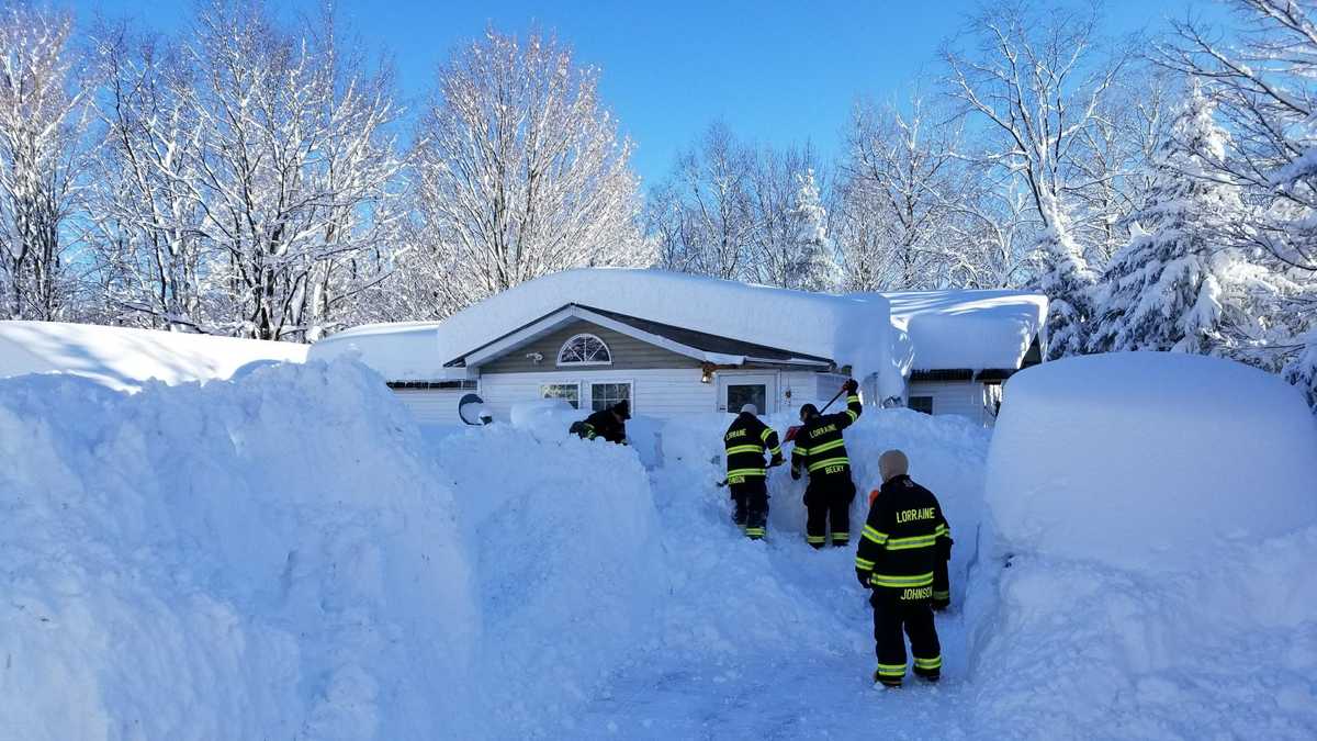 Woman rescued from home buried under 6 feet of snow