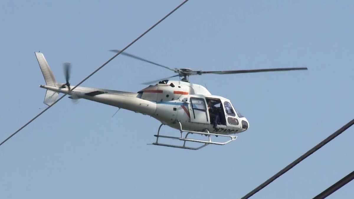 LOW-FLYING HELICOPTER checks power lines in Lancaster County