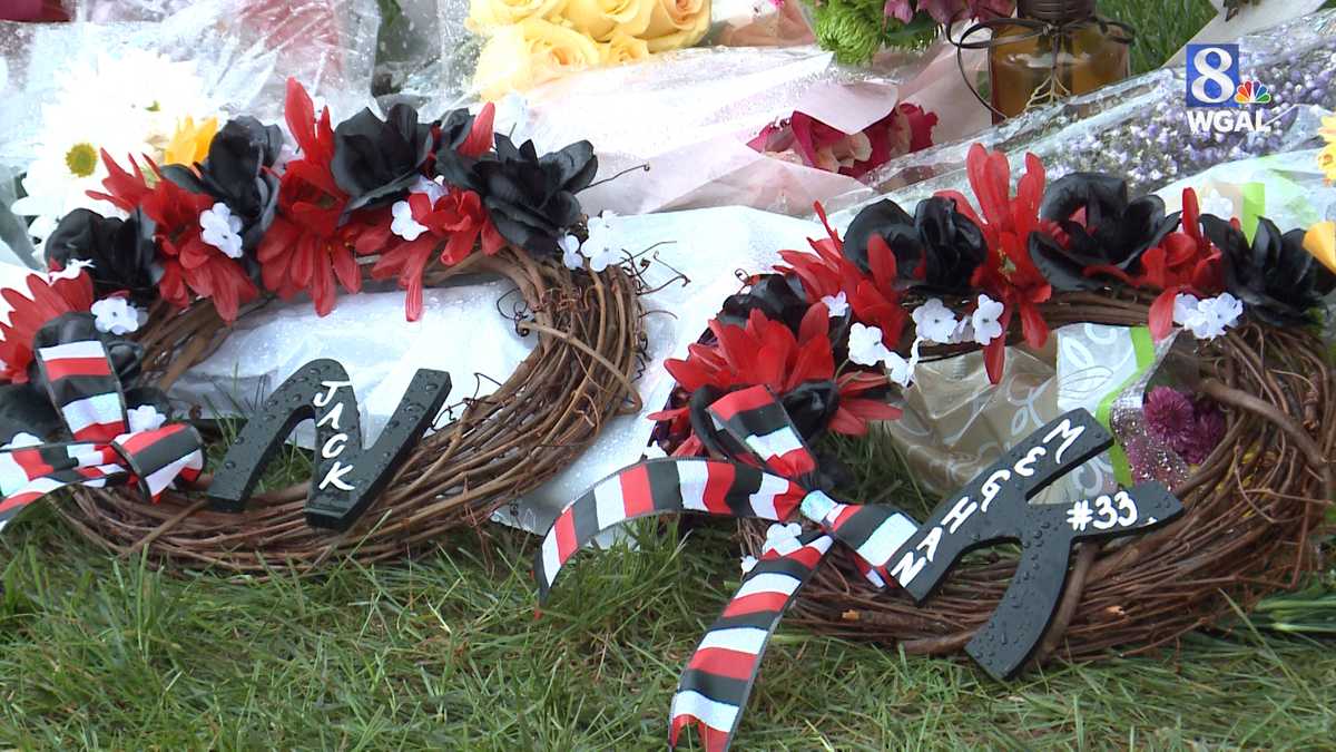 'I love you son' - Memorial for students grows across from high school