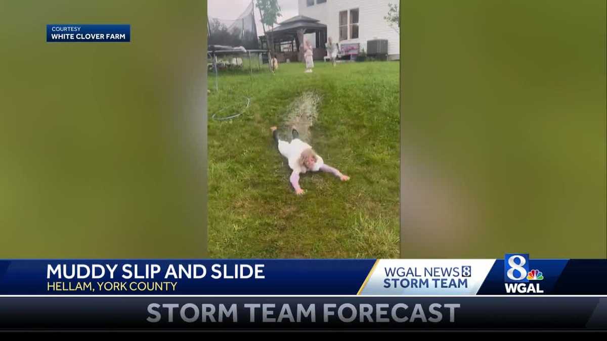 Kids giggle as they skid down muddy slip-and-slide at York County farm