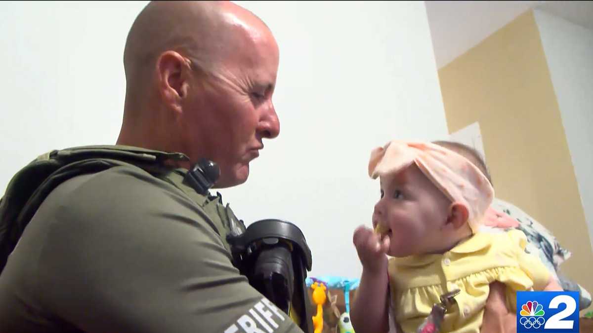 Heroic Charlotte County sergeant reunites with baby he saved in crash