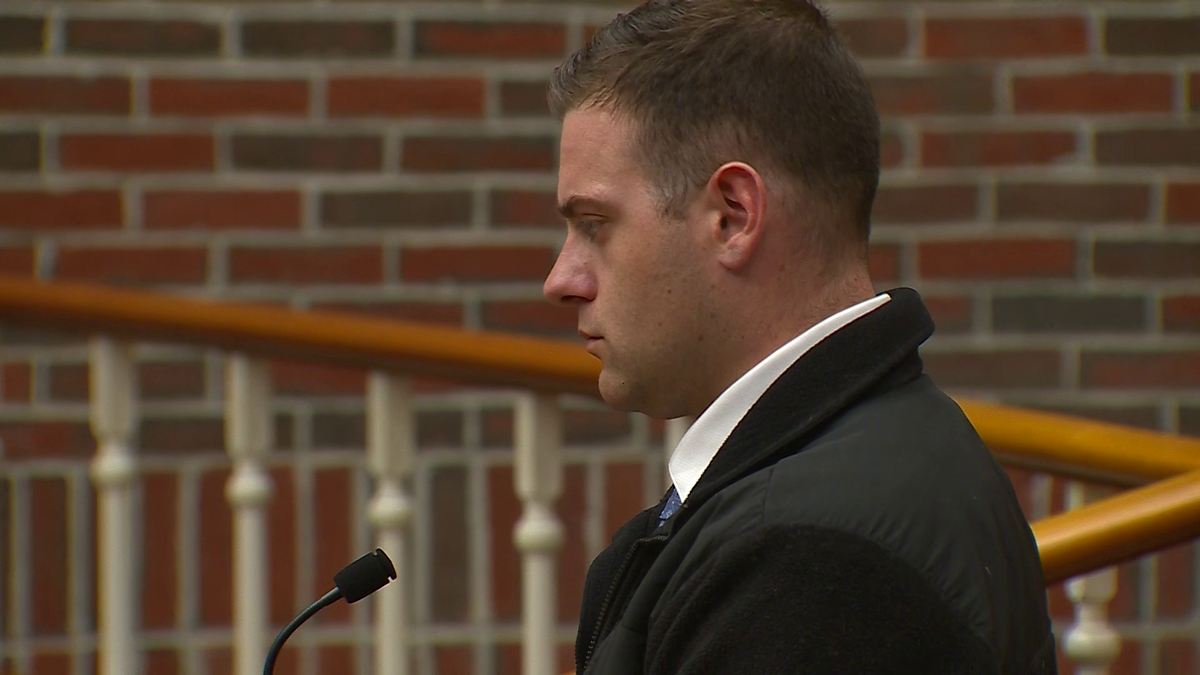 Mass. officer suspended, guns confiscated following his arrest