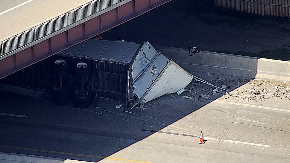 Semi rollover at busy OKC interstate junction causes delays