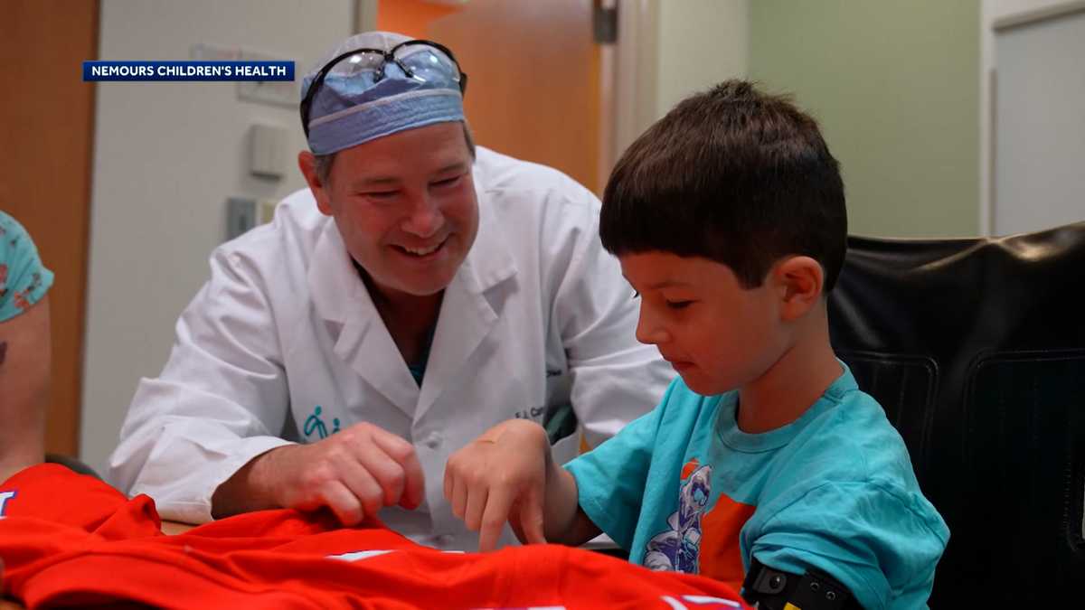 Boy who had NFL jersey cut off during emergency gets surprise