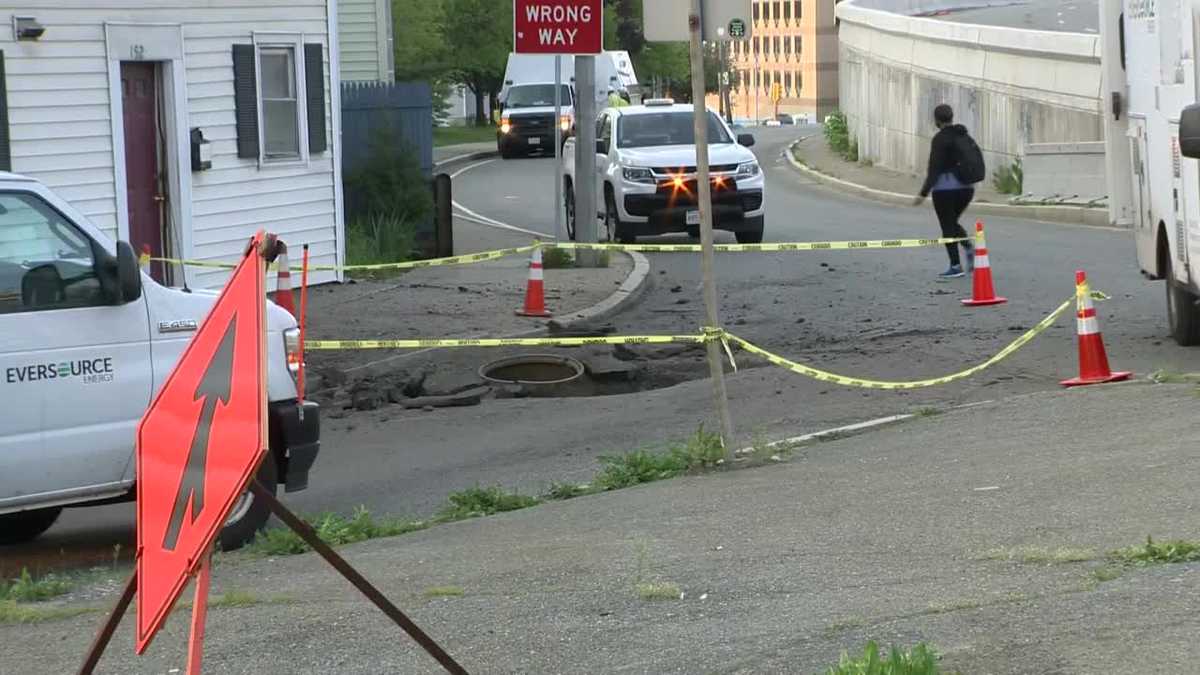 Manhole explosion shatters windows