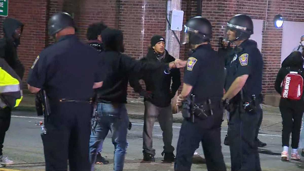 Brockton protesters fist bump with police after tense standoff