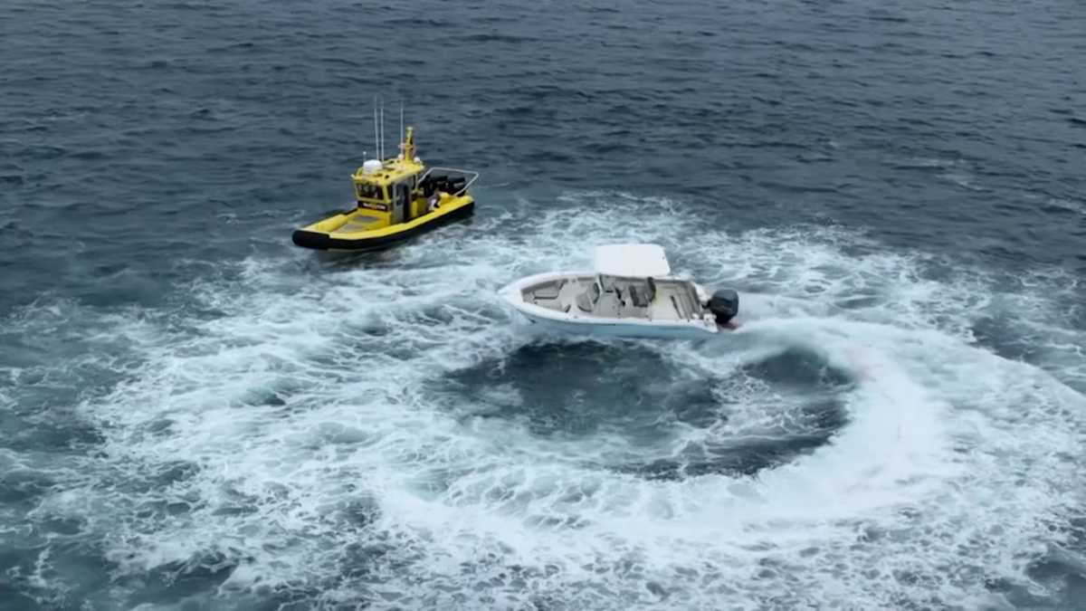 Crews stop runaway boat after 2 fall into water off Marshfield