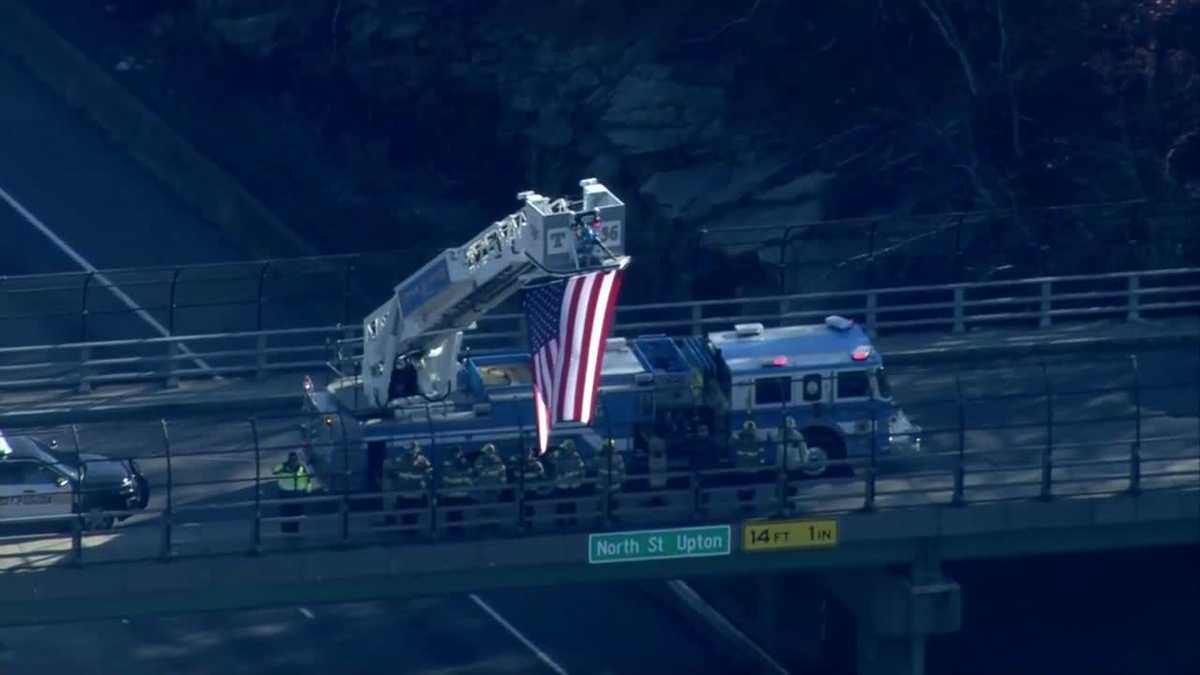 Firefighters, police salute procession for fallen firefighter