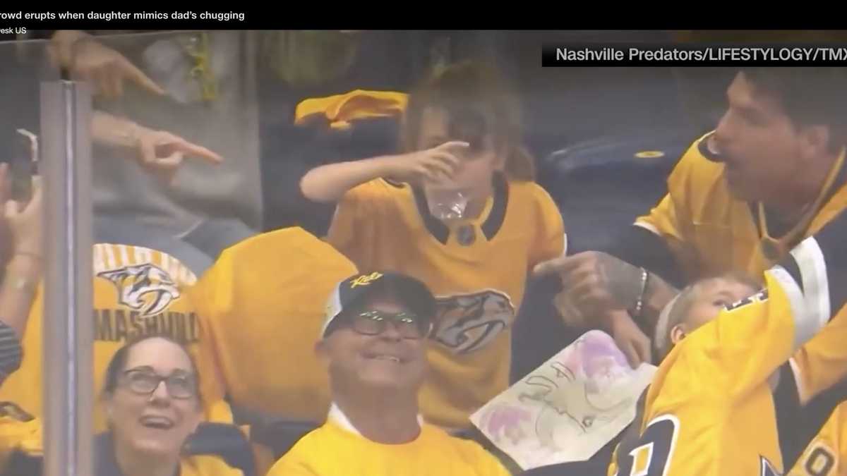 Hockey crowd erupts when daughter mimics dad’s chugging