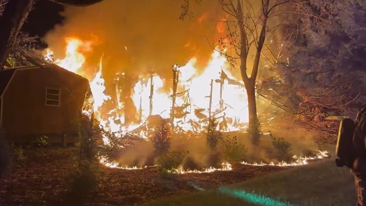 Video: Explosions heard while 'devastating fire' engulfs two garages ...