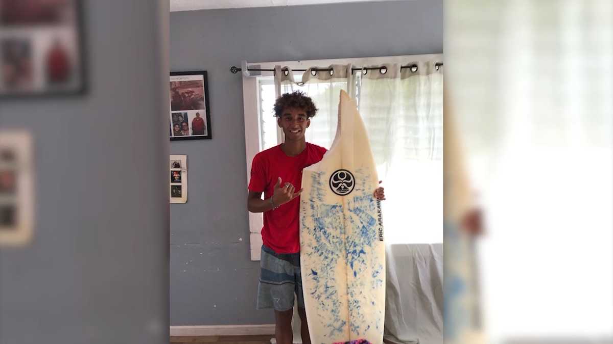 Teen survives after shark bites a chunk out of surfboard