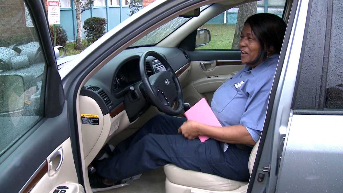 Elementary school janitor surprised with new SUV