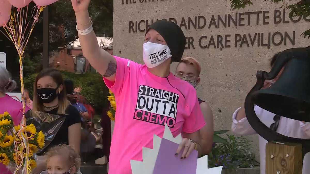 Breast cancer survivor takes her bell ringing ceremony outside