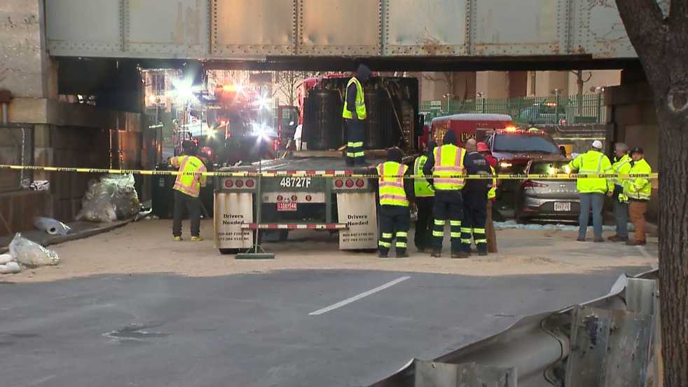 Truck hits Storrow Drive bridge; crews work to clean up leak