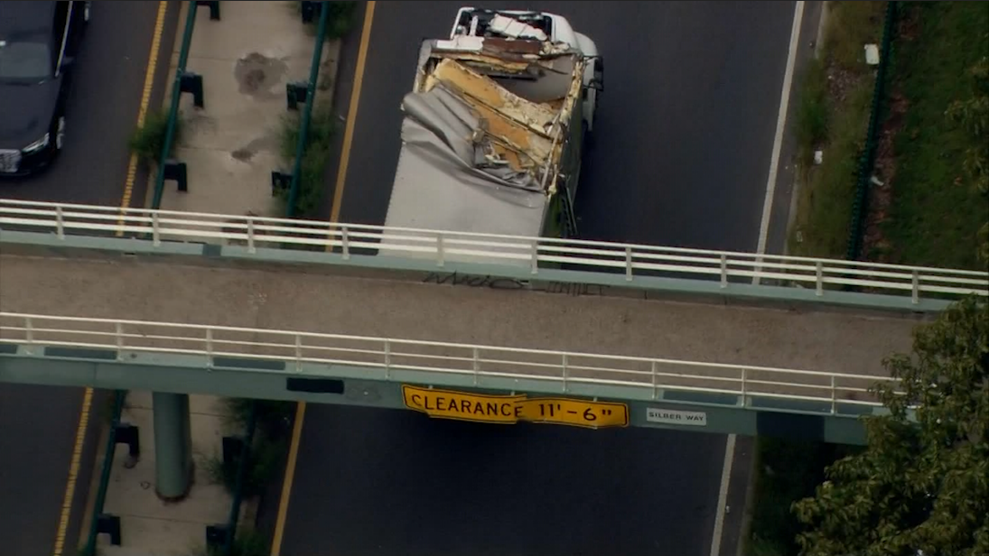 Food service truck damaged after hitting bridge on Storrow Drive